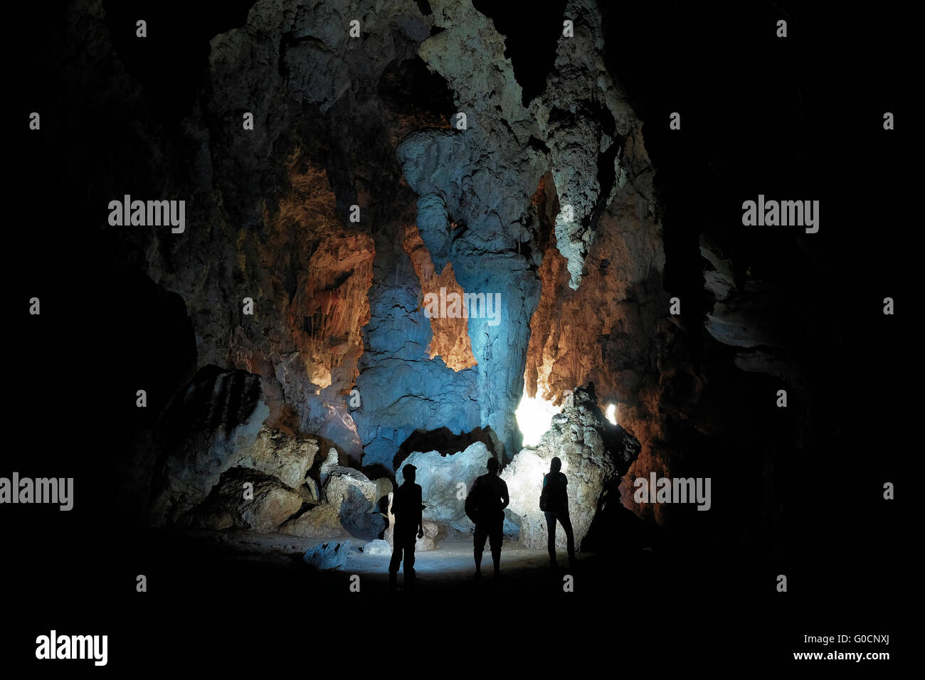 People hiking inside the Candelaria natural cave system famous for its ...