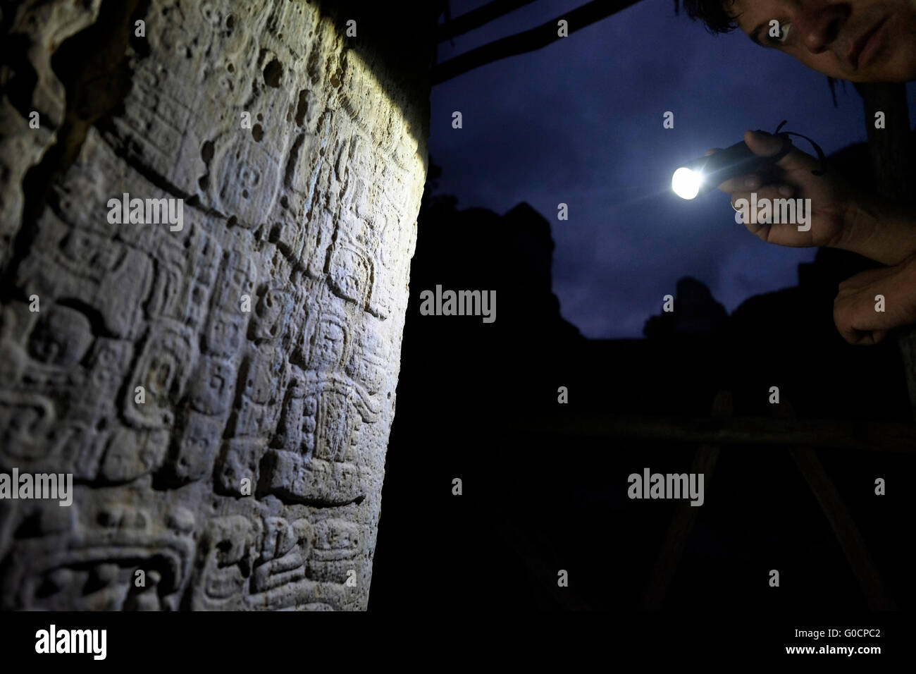 Detail of an ancient Mayan hieroglyphic script or glyph in a stele at ...