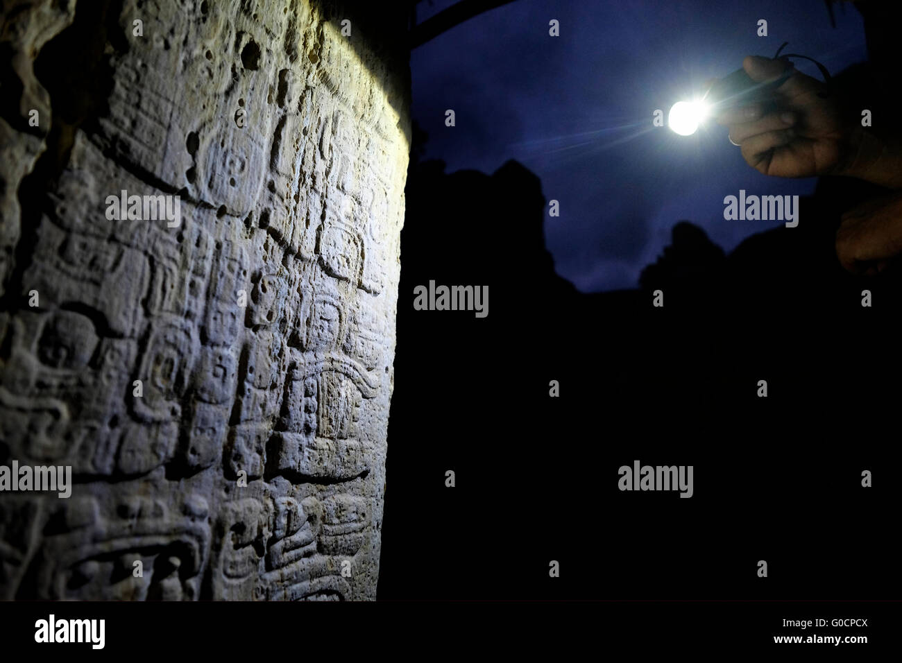 Detail of an ancient Mayan hieroglyphic script or glyph in a stele at ...