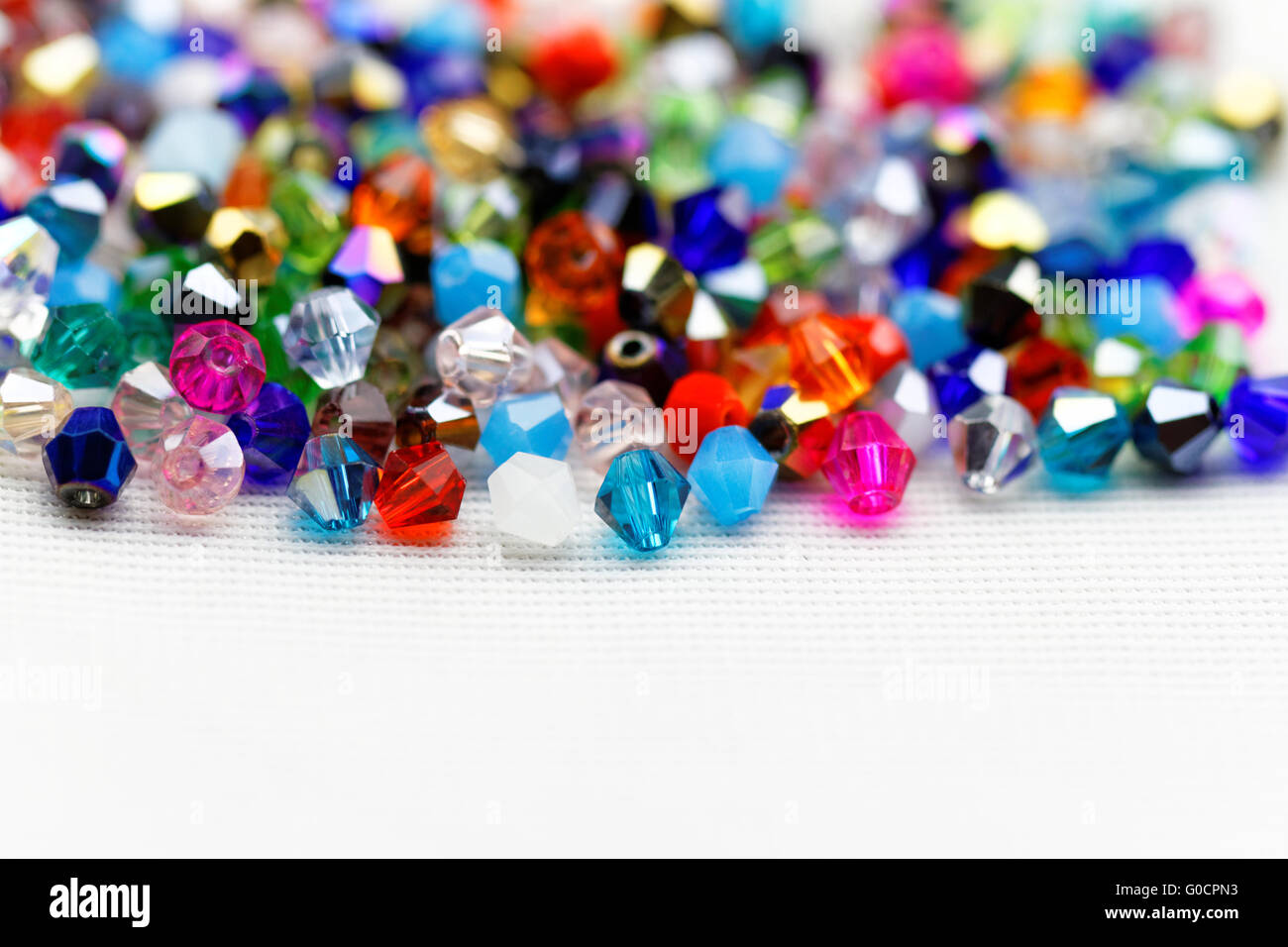 Beautiful glass beads closeup on white background Stock Photo - Alamy