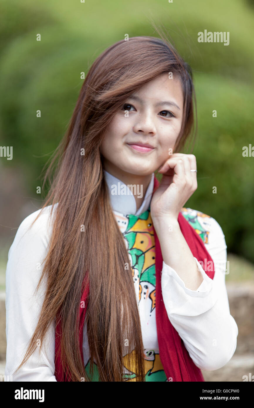 Vietnamese women pose for camera during local ceremony in Dalat City ...