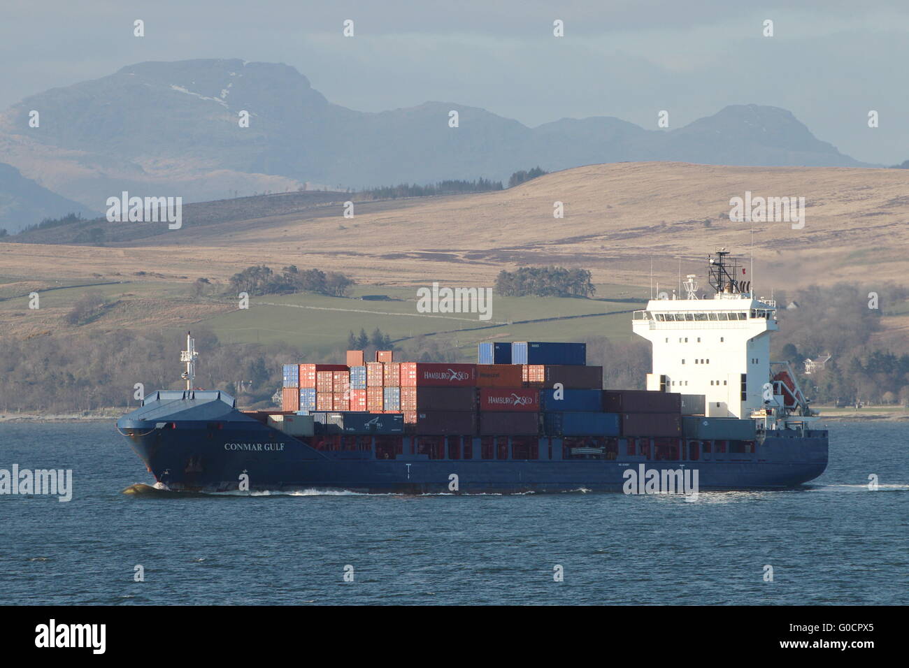The container ship Conmar Gulf, passing Cloch Point on the Firth of ...