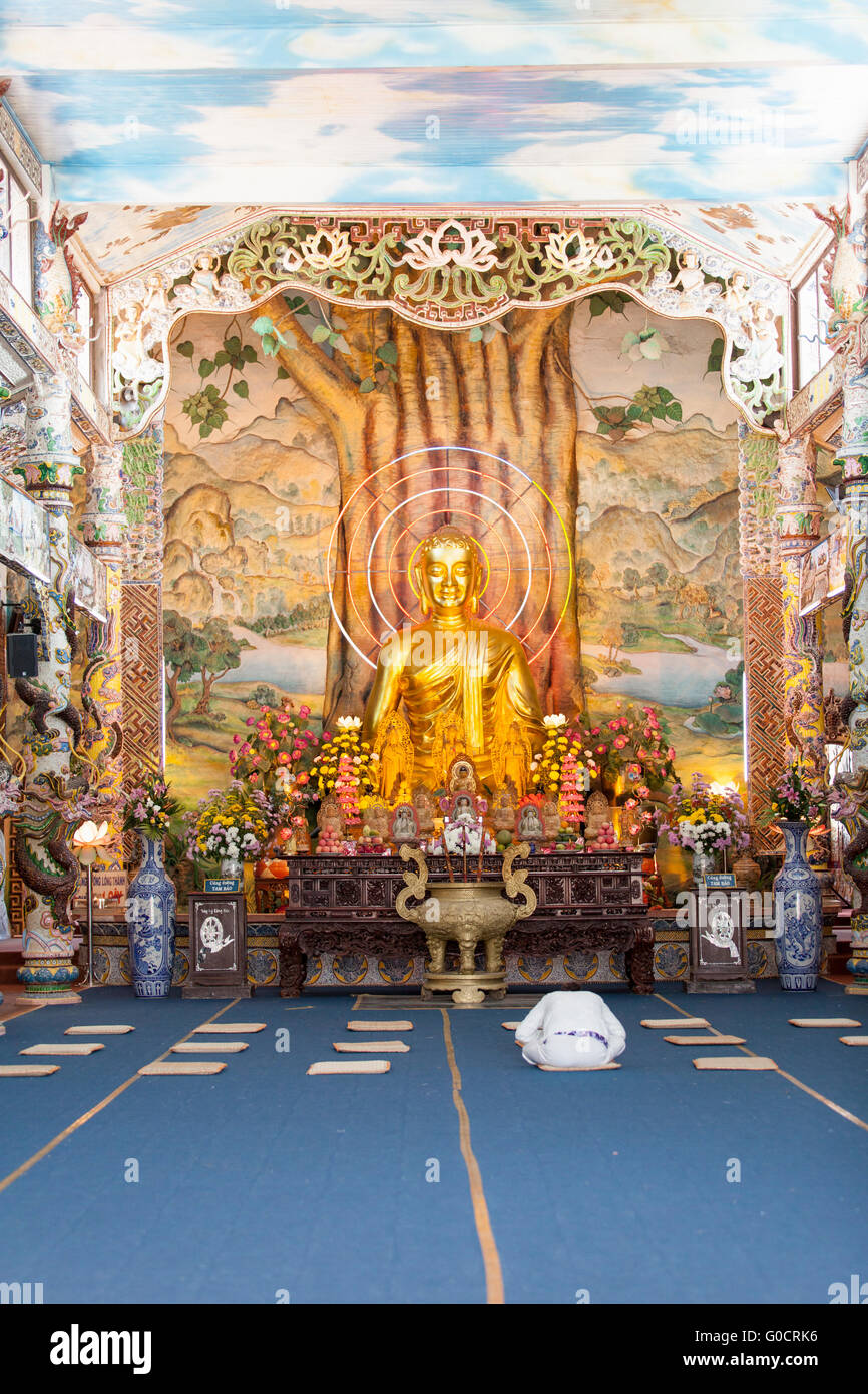 Praying inside temple hi-res stock photography and images - Alamy