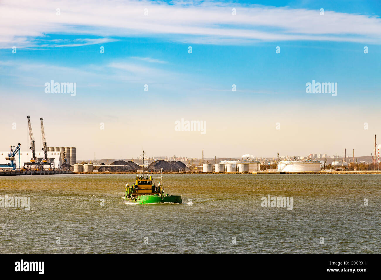 In a photo the barge floating on sea Stock Photo - Alamy