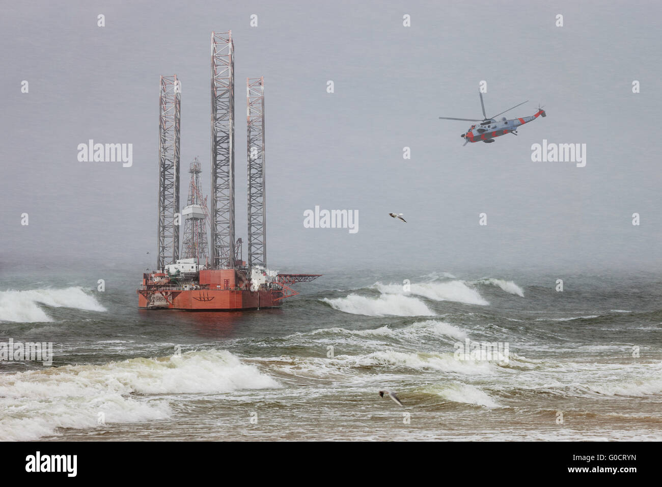 Oil rig in a winter storm day during a violent blizzard Stock Photo - Alamy