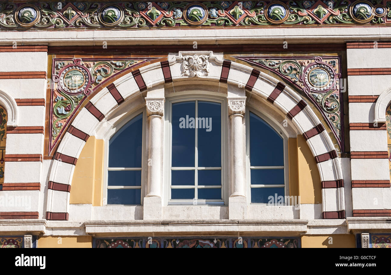 Arched window with colorful ornaments of beautiful Stock Photo - Alamy