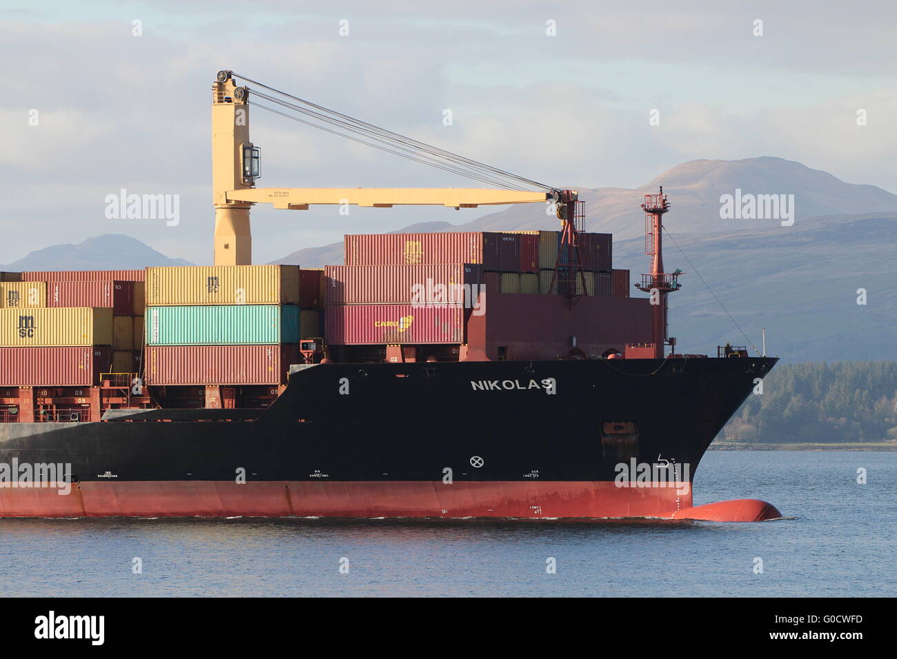 The container ship Nikolas, assisted by the Svitzer tug Ayton Cross ...