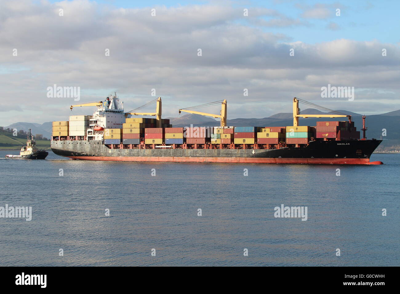 The container ship Nikolas, assisted by the Svitzer tug Ayton Cross ...