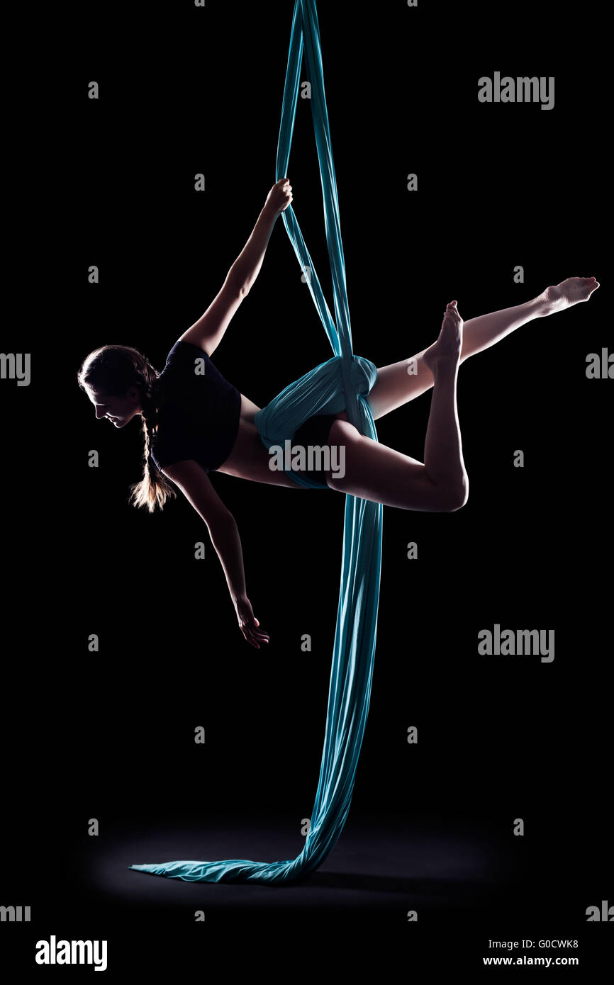 Young woman gymnast with blue gymnastic ribbon Stock Photo - Alamy