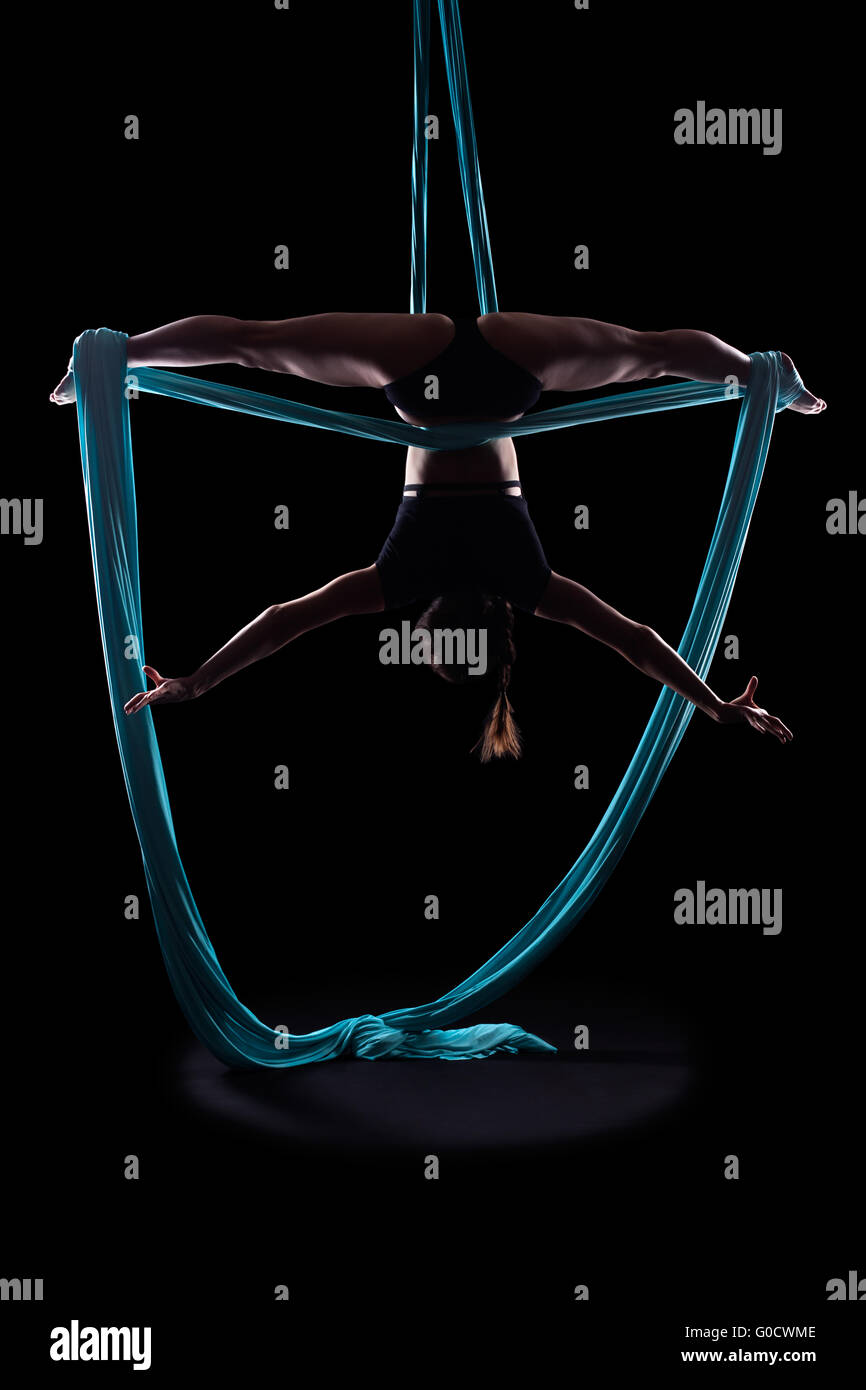 Young woman gymnast with blue gymnastic ribbon Stock Photo - Alamy