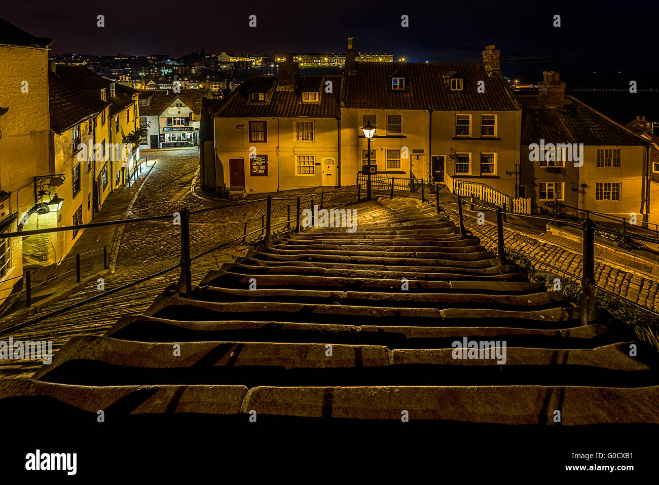 Ghostly nighttime picture of the famous 199 steps at Whitby, which lead ...