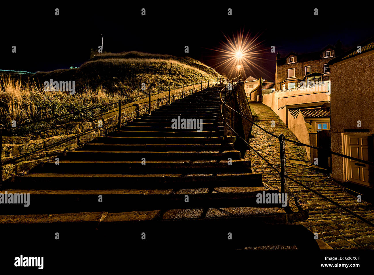 Ghostly nighttime picture of the famous 199 steps at Whitby, which lead ...
