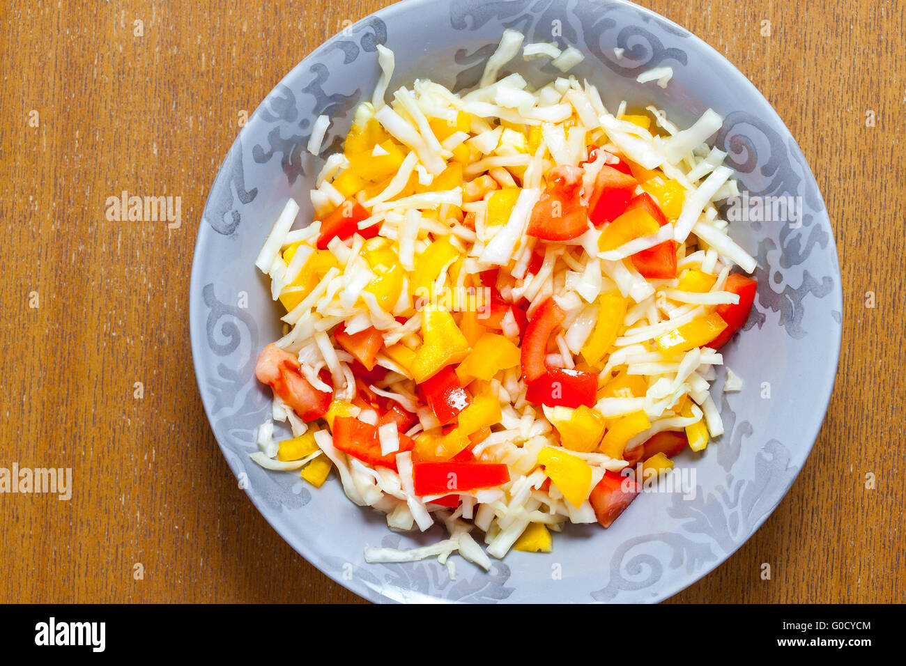 Assorted salad with fresh vegetables in plate Stock Photo - Alamy