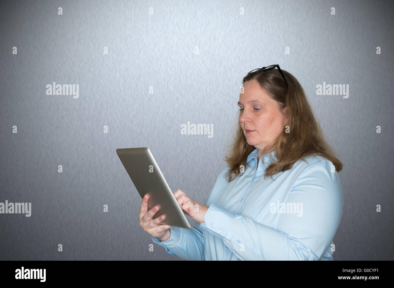 Women looking for information with the tablet Stock Photo - Alamy
