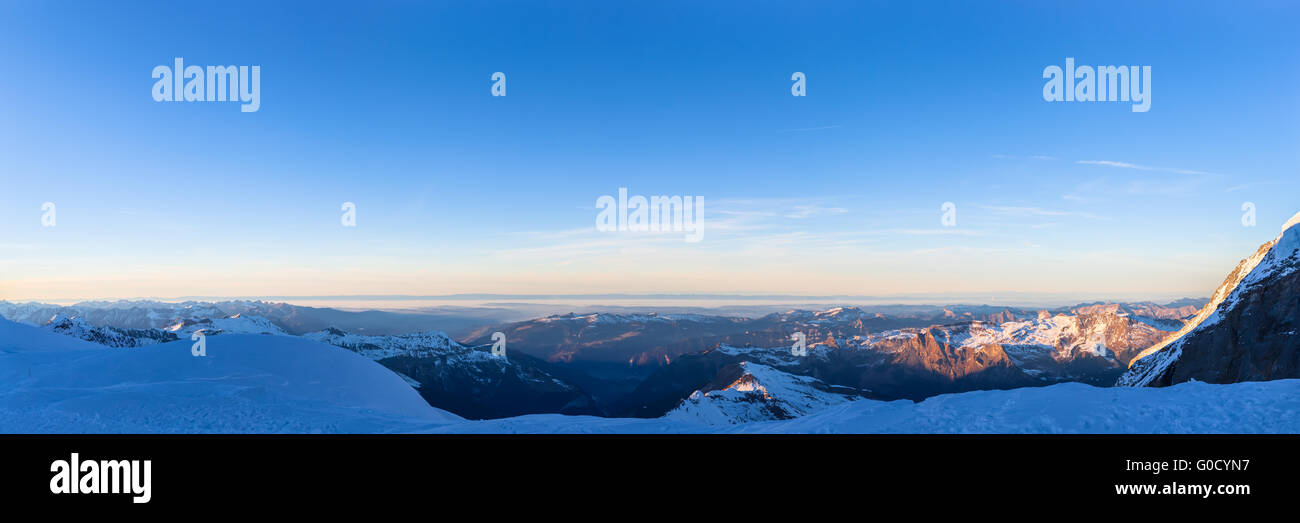 Panorama view of the mountain range of Bernese Alps at dusk from ...