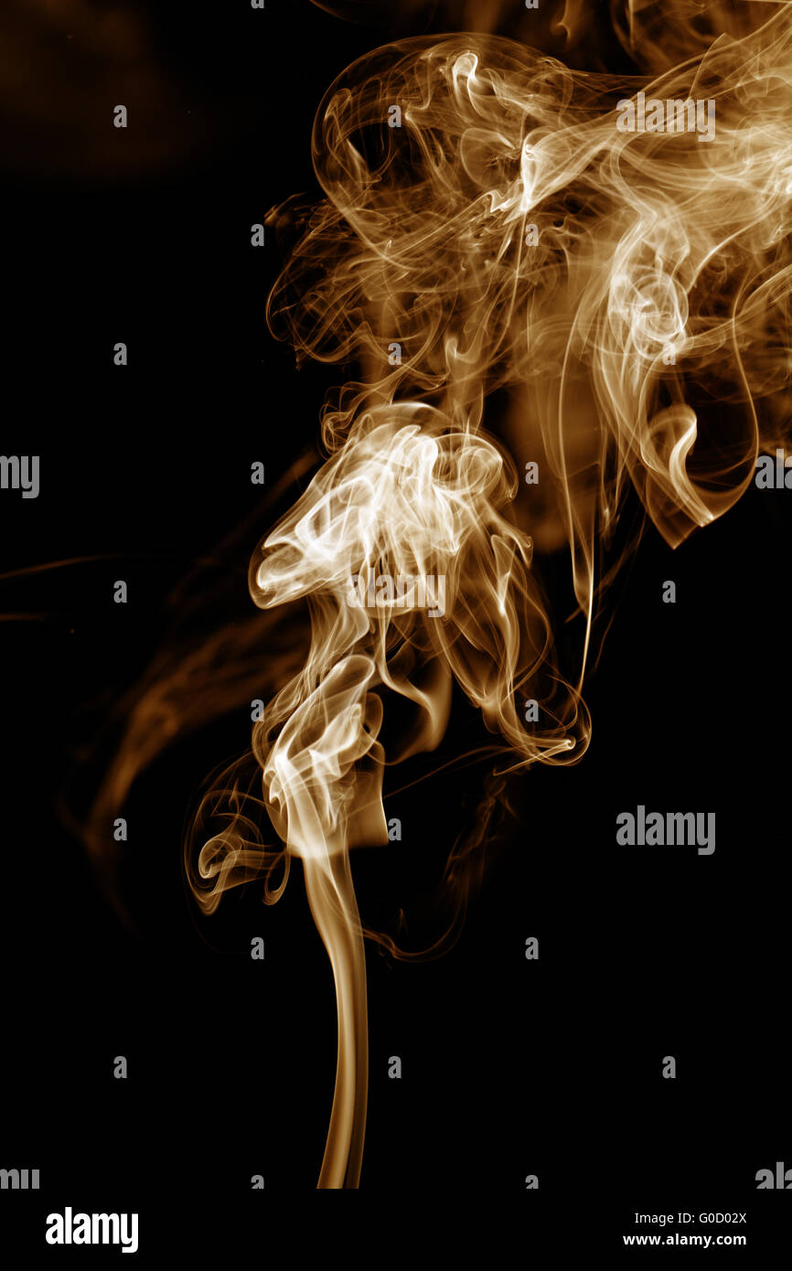 Beautiful smoke on the black background - macro photo Stock Photo - Alamy