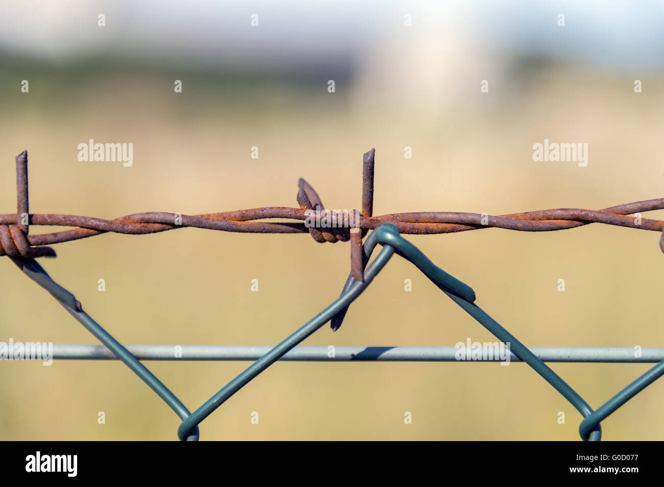 Rusty barbed wire blurred hi-res stock photography and images - Alamy