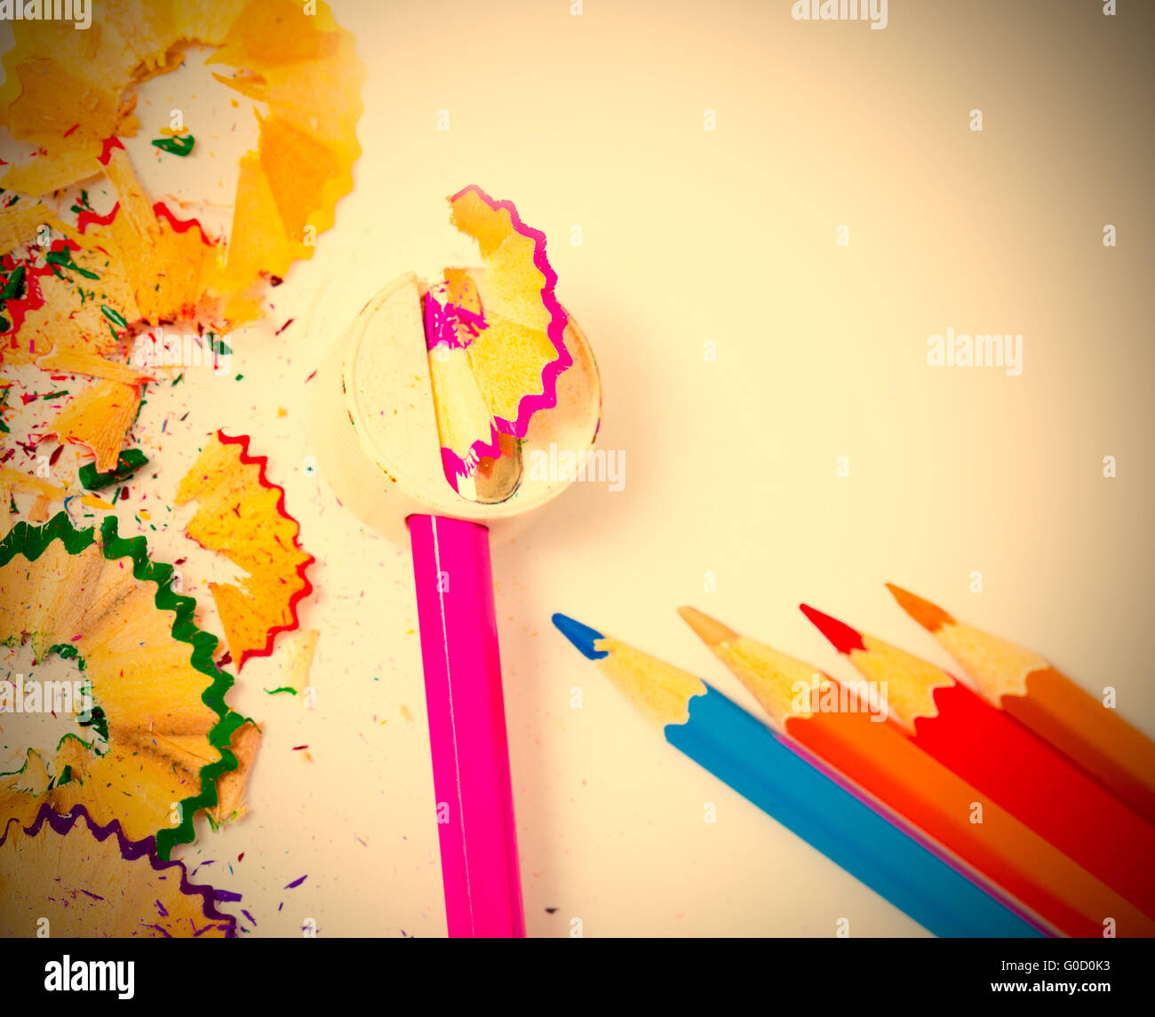 set of colored pencils, sharpener and shavings Stock Photo - Alamy