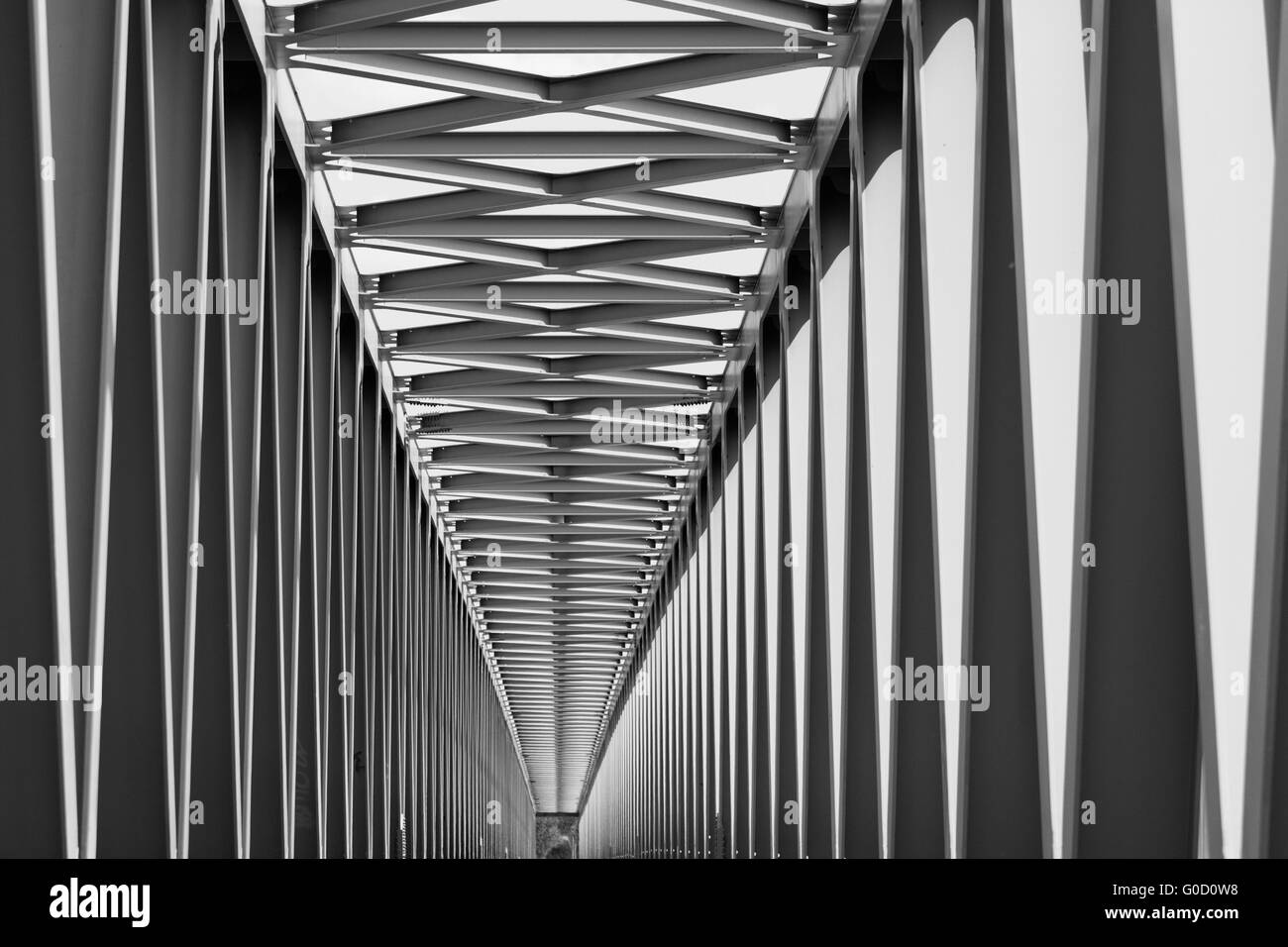 Railway metal bridge perspective view Stock Photo - Alamy