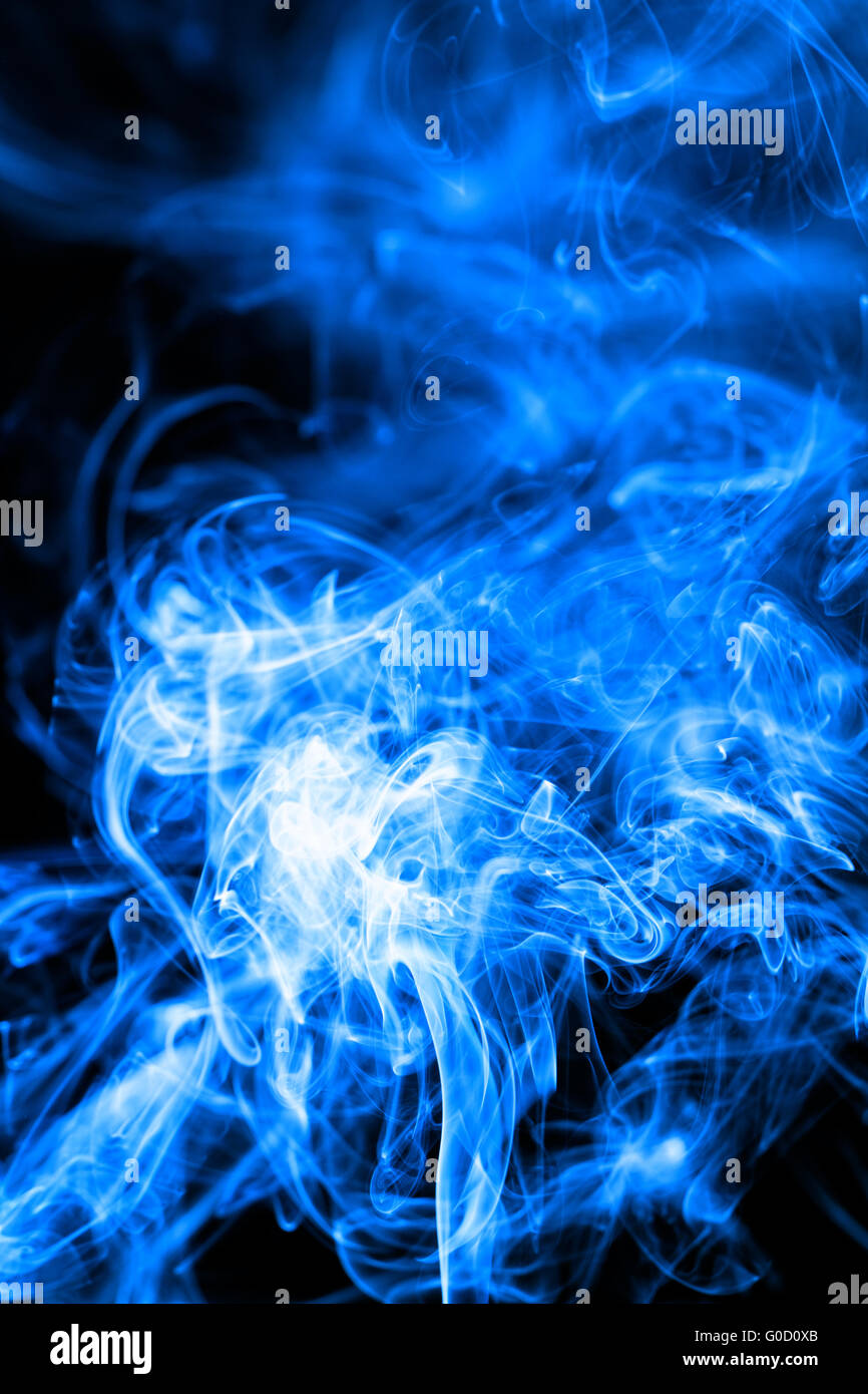 Beautiful smoke on the black background - macro photo Stock Photo - Alamy