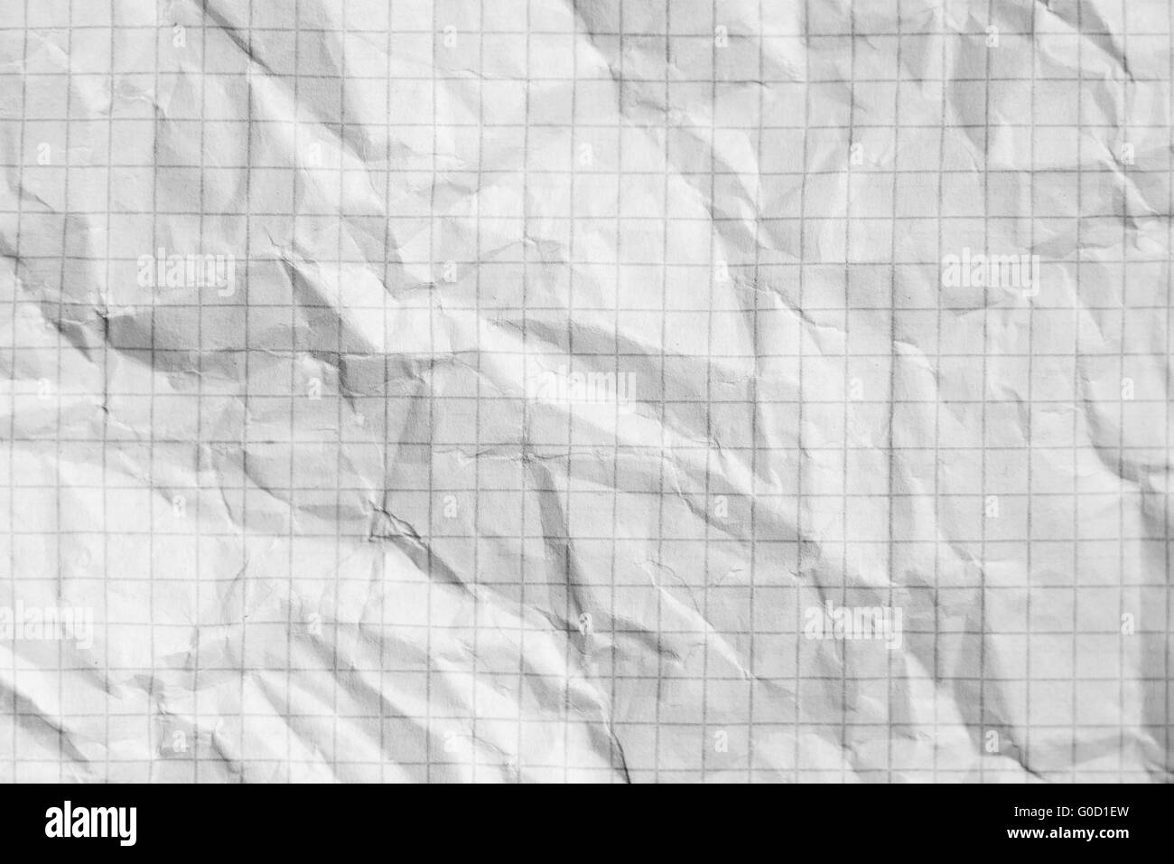 Part of the surface crumpled checkered paper. macro Stock Photo - Alamy