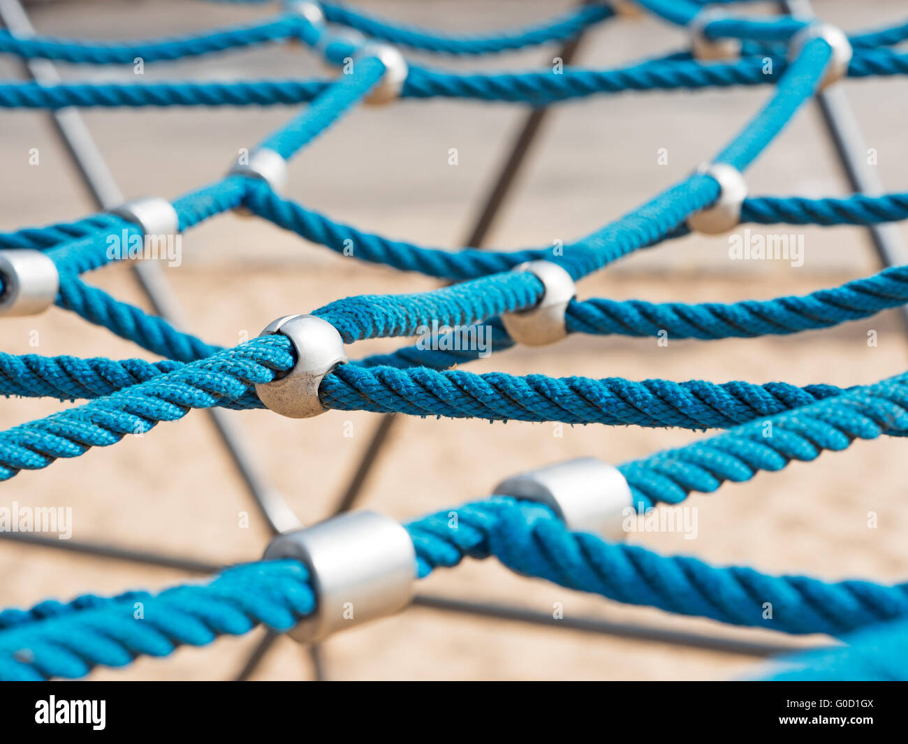 networked ropes on climbing frame Stock Photo - Alamy