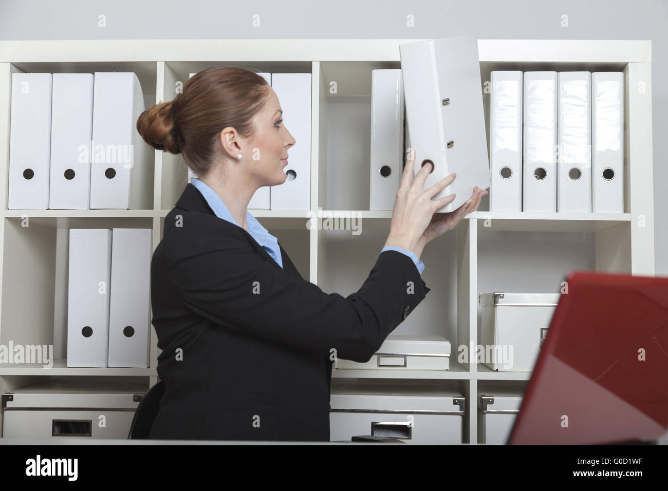 secretary takes a folder Stock Photo - Alamy
