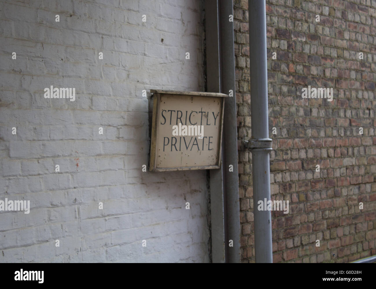 Vintage Strictly Private sign hangs in an alleyway off of High Barnet ...