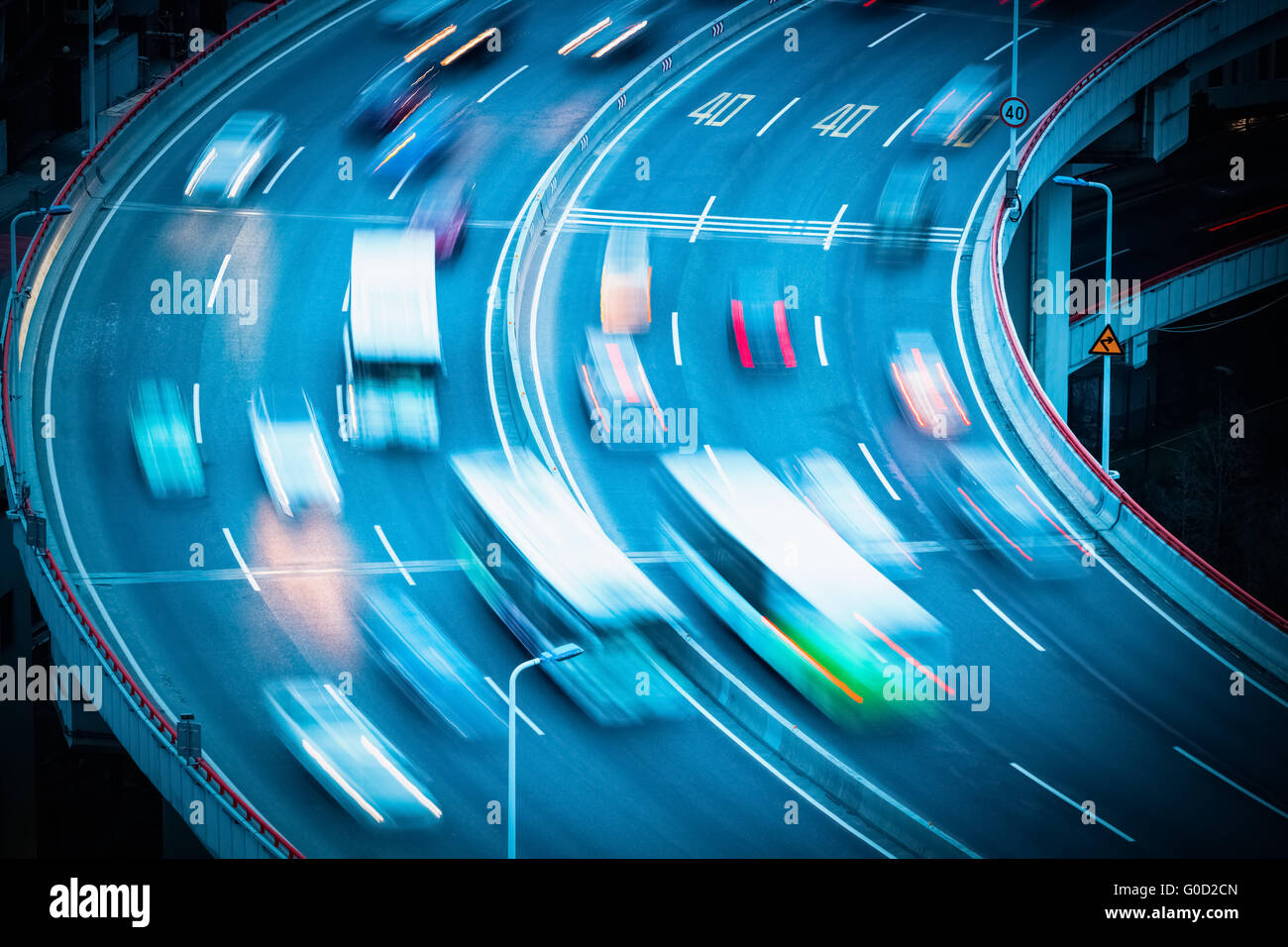 vehicles motion blur on curve bridge approach Stock Photo - Alamy