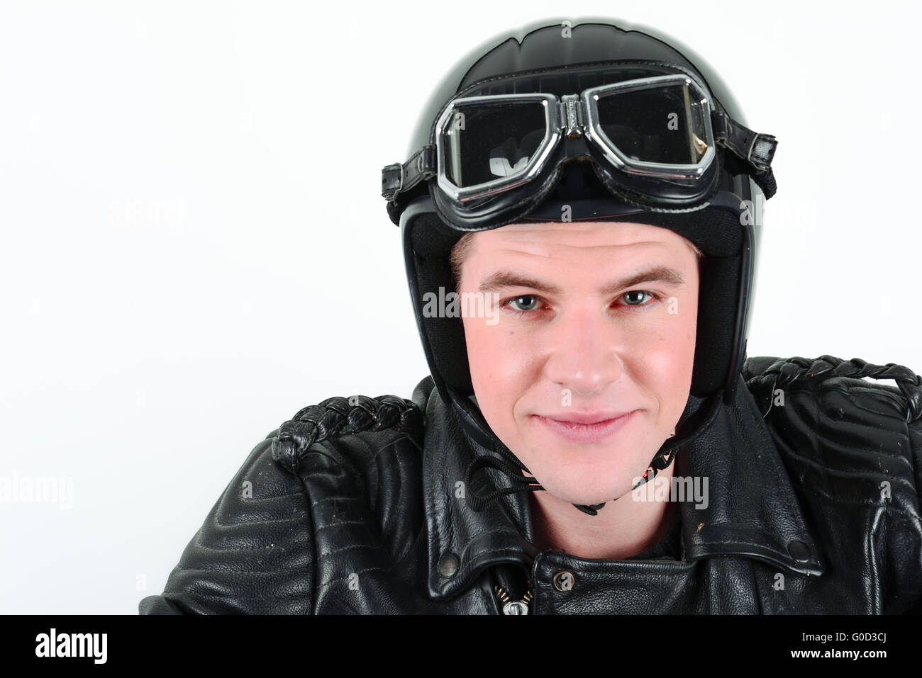 Motorcyclist on a light background Stock Photo - Alamy