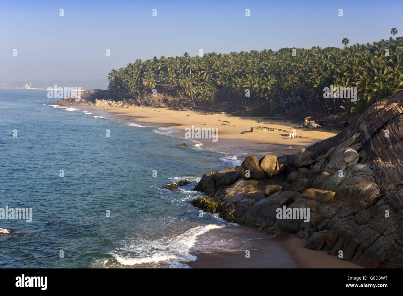 seashore with stones and palm trees. India. Kerala Stock Photo - Alamy