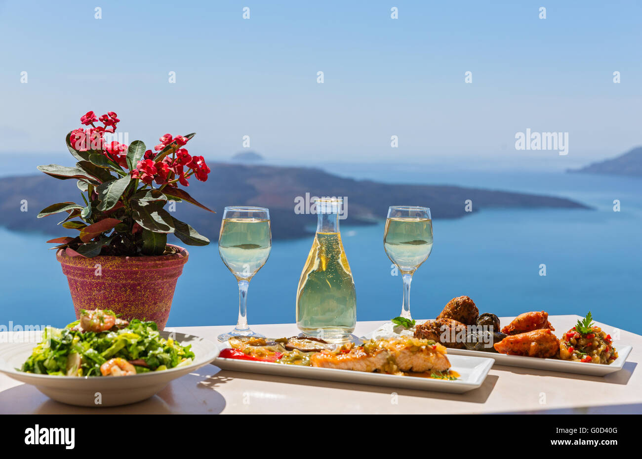 Lunch by the sea, Greece, island Santorini Stock Photo - Alamy