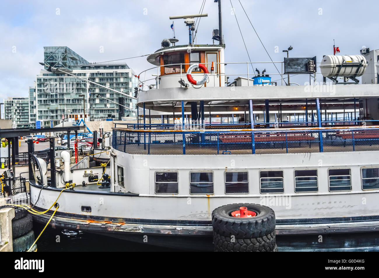 Toronto, Canada - August 27, 2015: A ferry boarding at the dock in ...