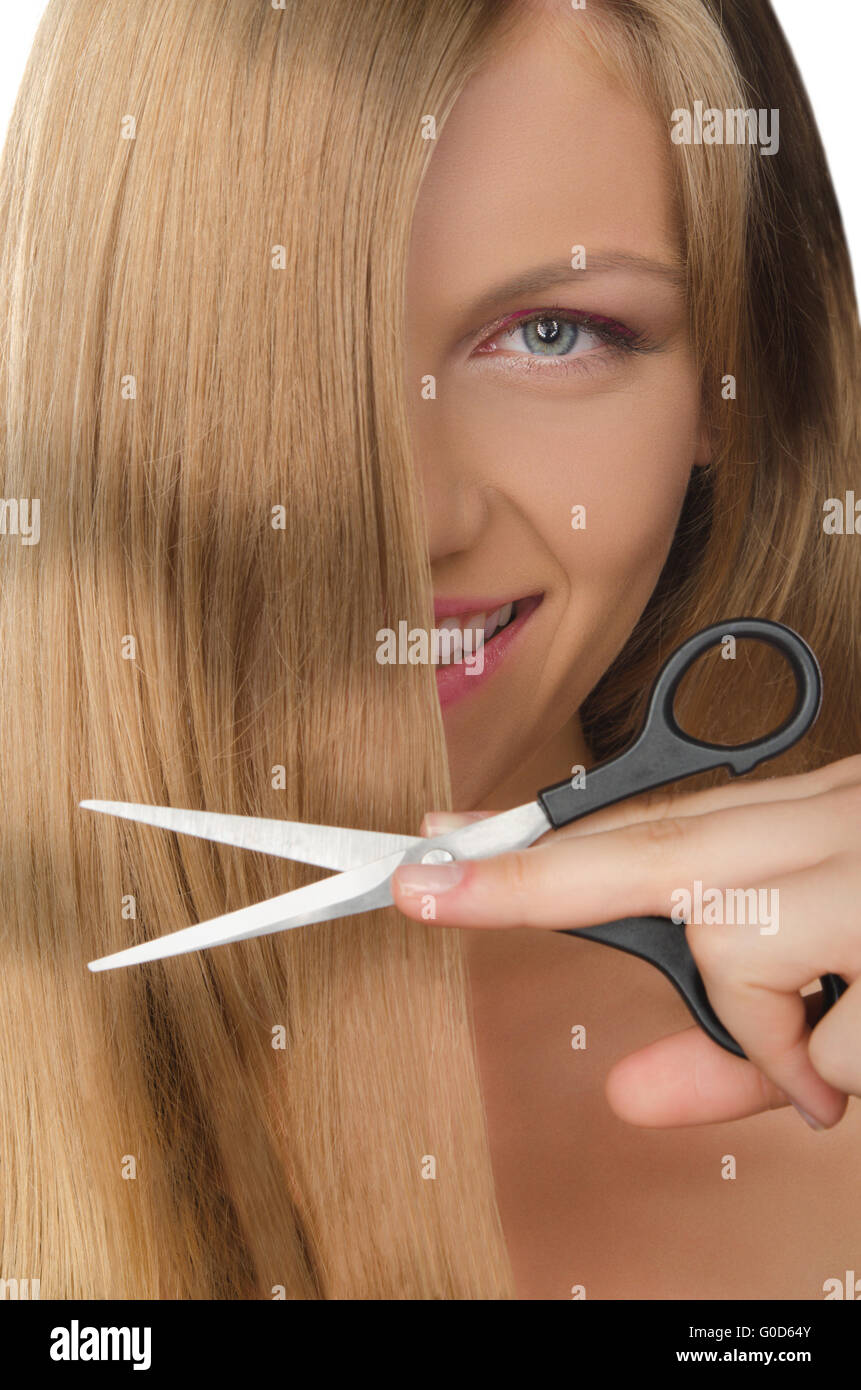 Beautiful woman with straight hair and scissors Stock Photo - Alamy
