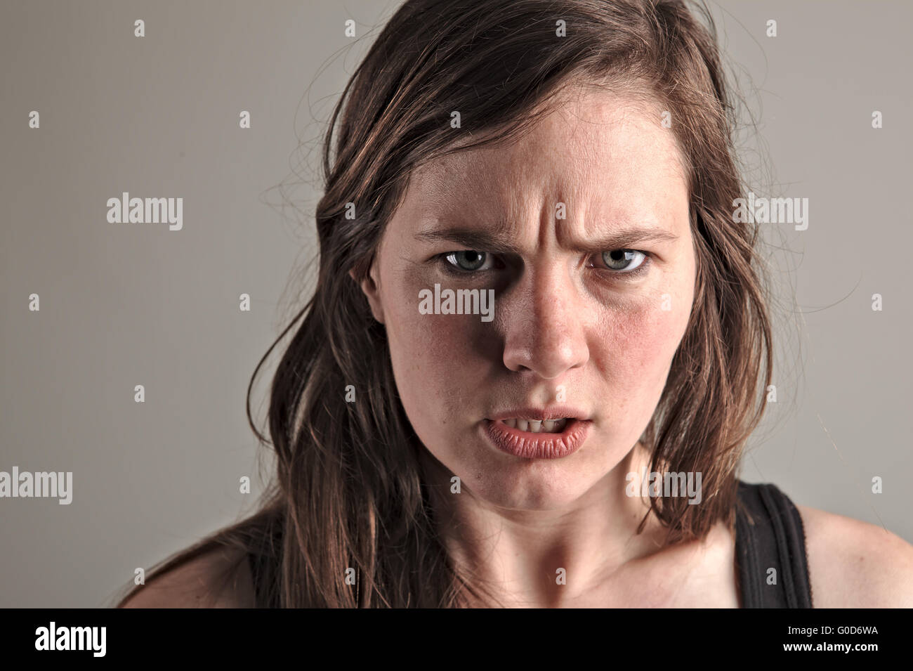 Young woman is angry Stock Photo - Alamy