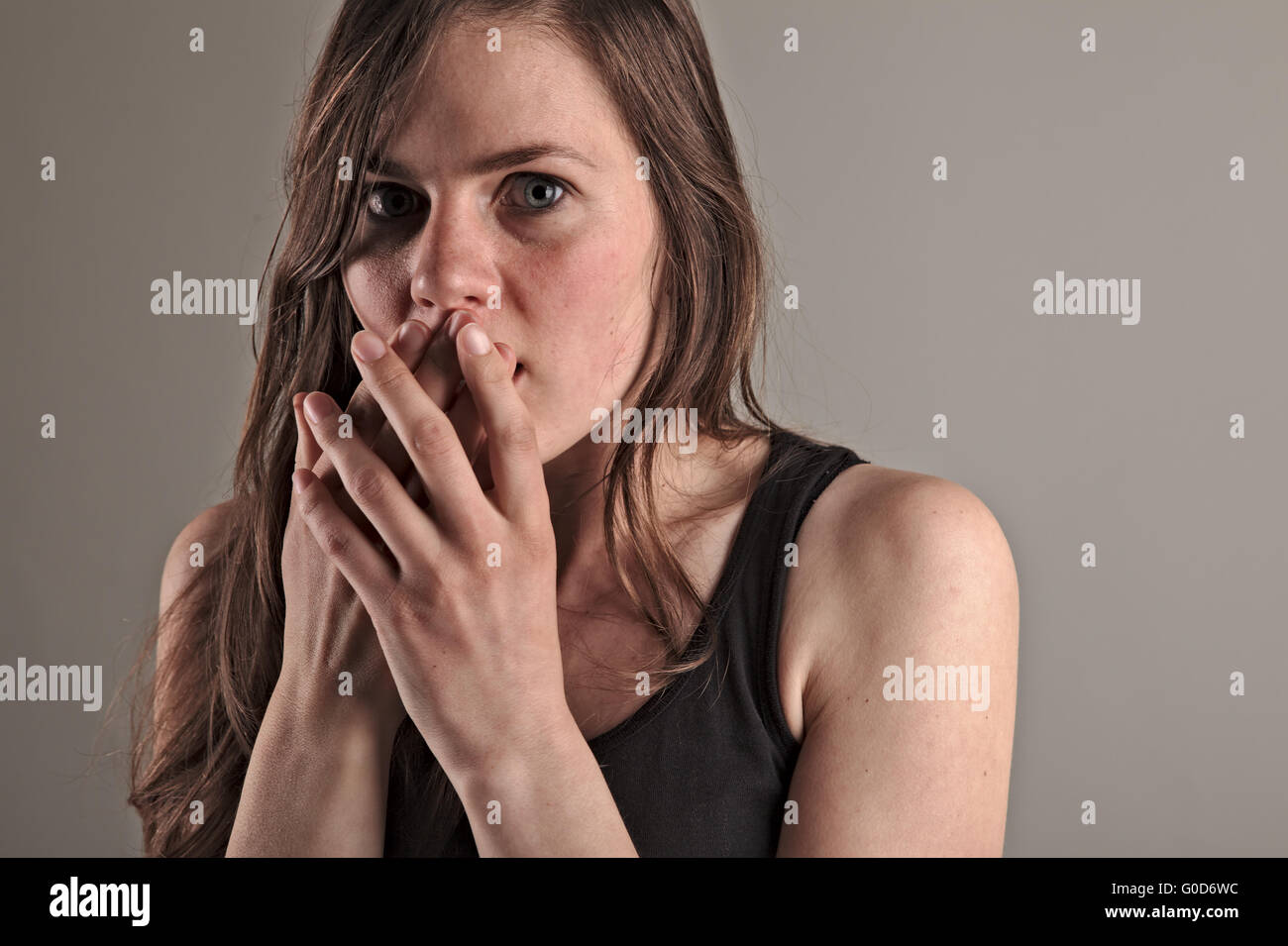 Young woman is scared Stock Photo - Alamy