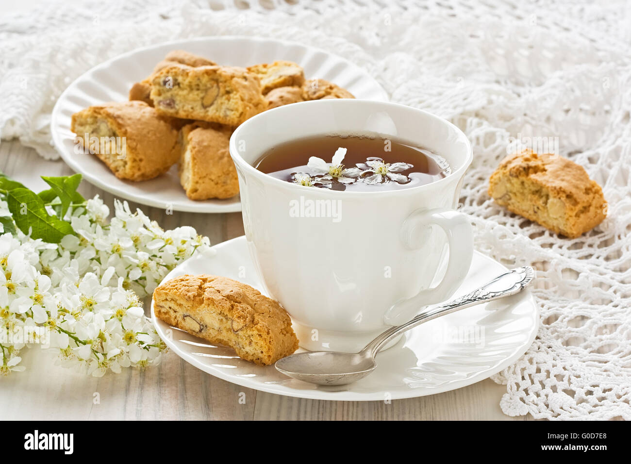 Cup bird-cherry tea Stock Photo - Alamy