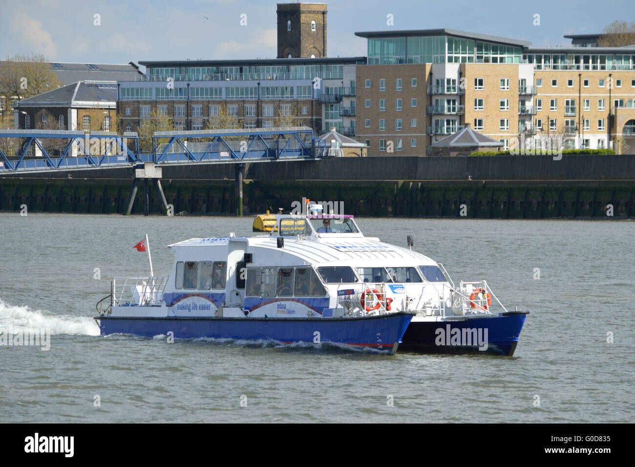 MBNA Thames Clipper's Storm Clipper river bus heading up the river ...