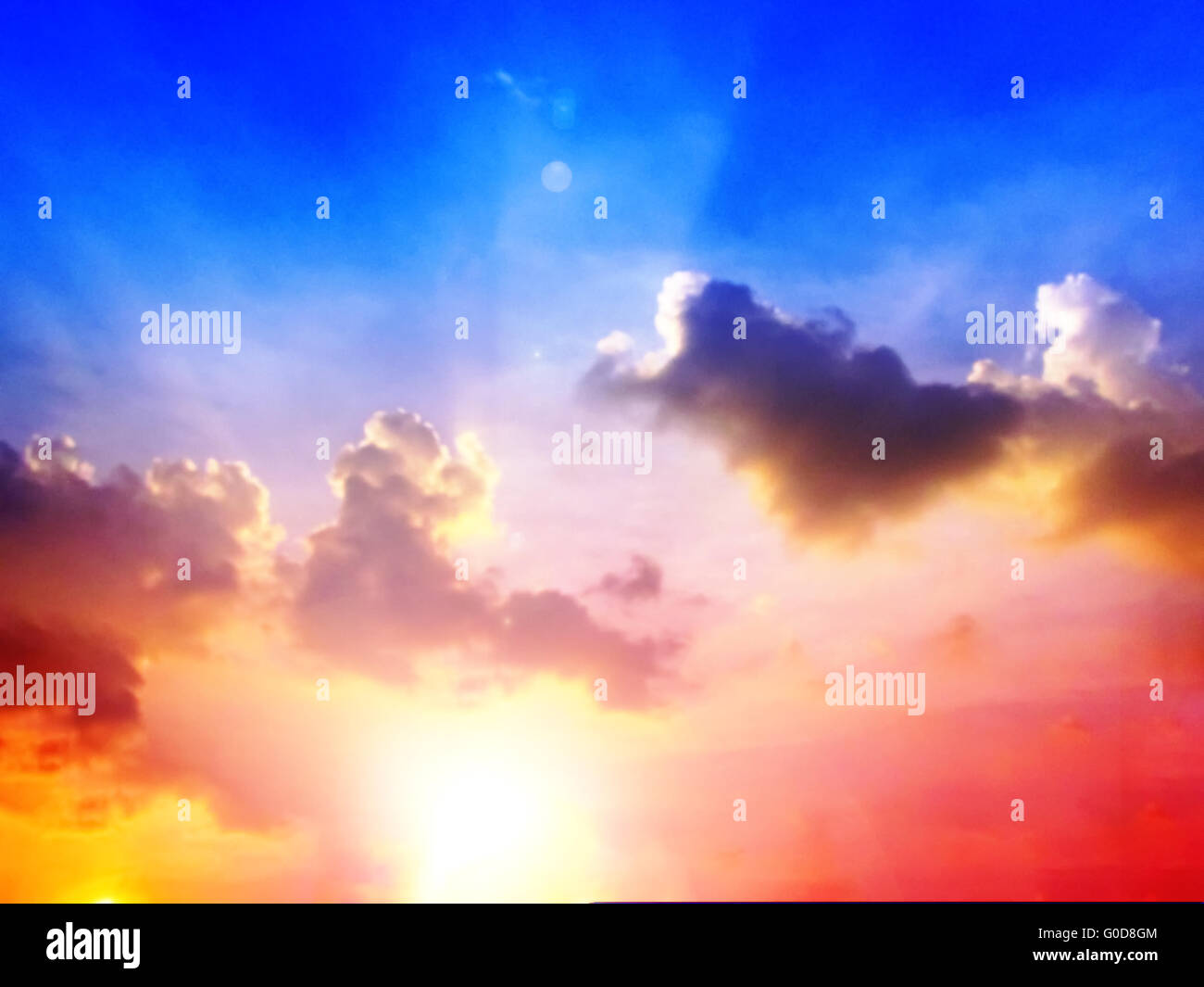 Sunset sky of multiple colors and sunlight Stock Photo - Alamy