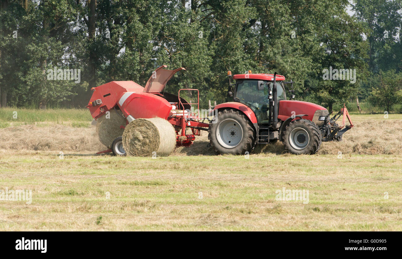 Round baler in haymaking hi-res stock photography and images - Alamy