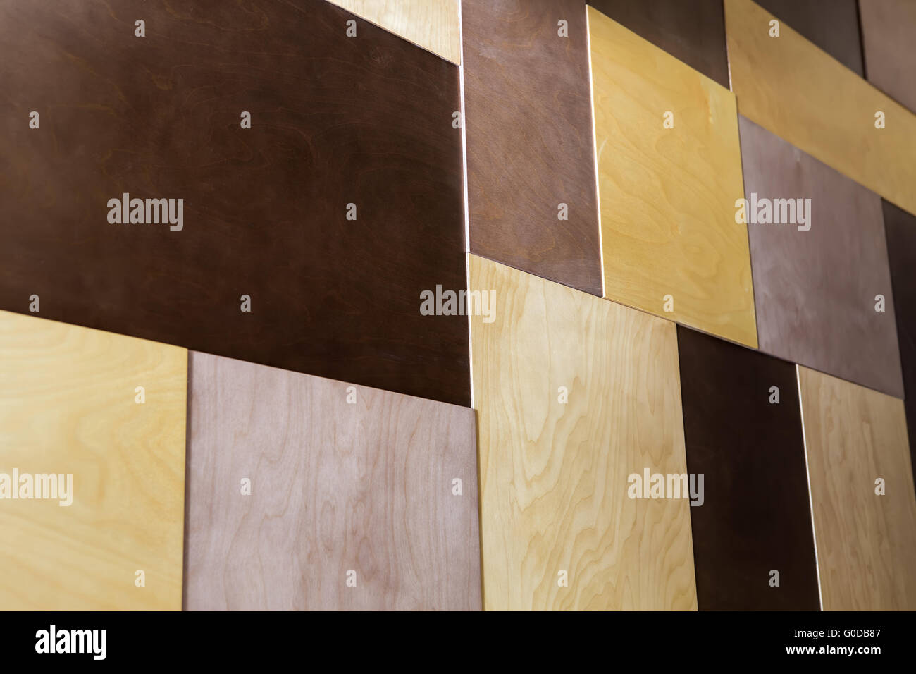 Decorative wood tile plywood in different colors. Decorating the walls ...