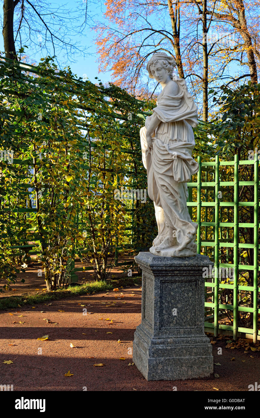 Marble statues in Summer garden Stock Photo - Alamy