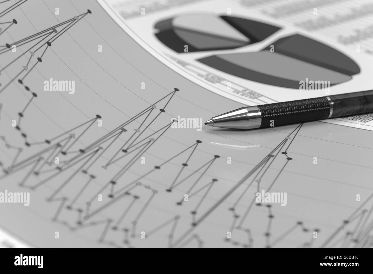finance calculation with chart and pen Stock Photo - Alamy