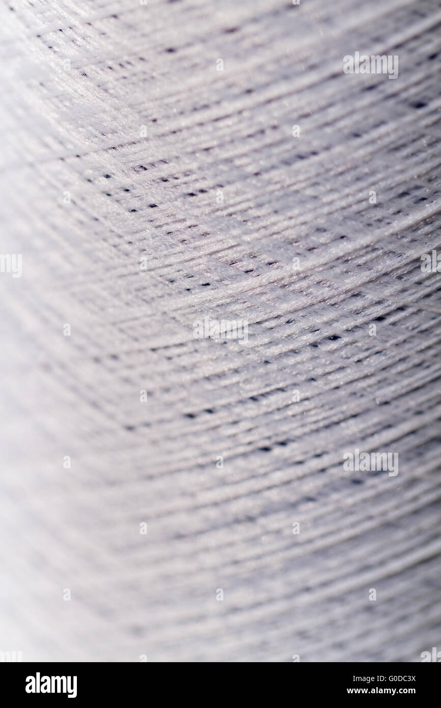 Close up photo of white thread in the sewing Stock Photo - Alamy