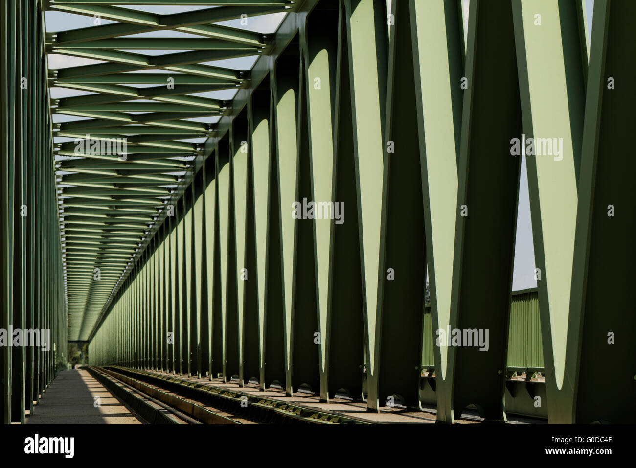 Railway metal bridge perspective view Stock Photo - Alamy