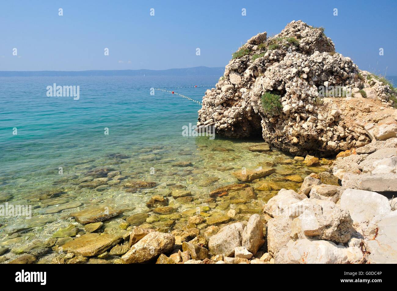 Beautiful beach with stones on Podgora, Croatia Stock Photo - Alamy