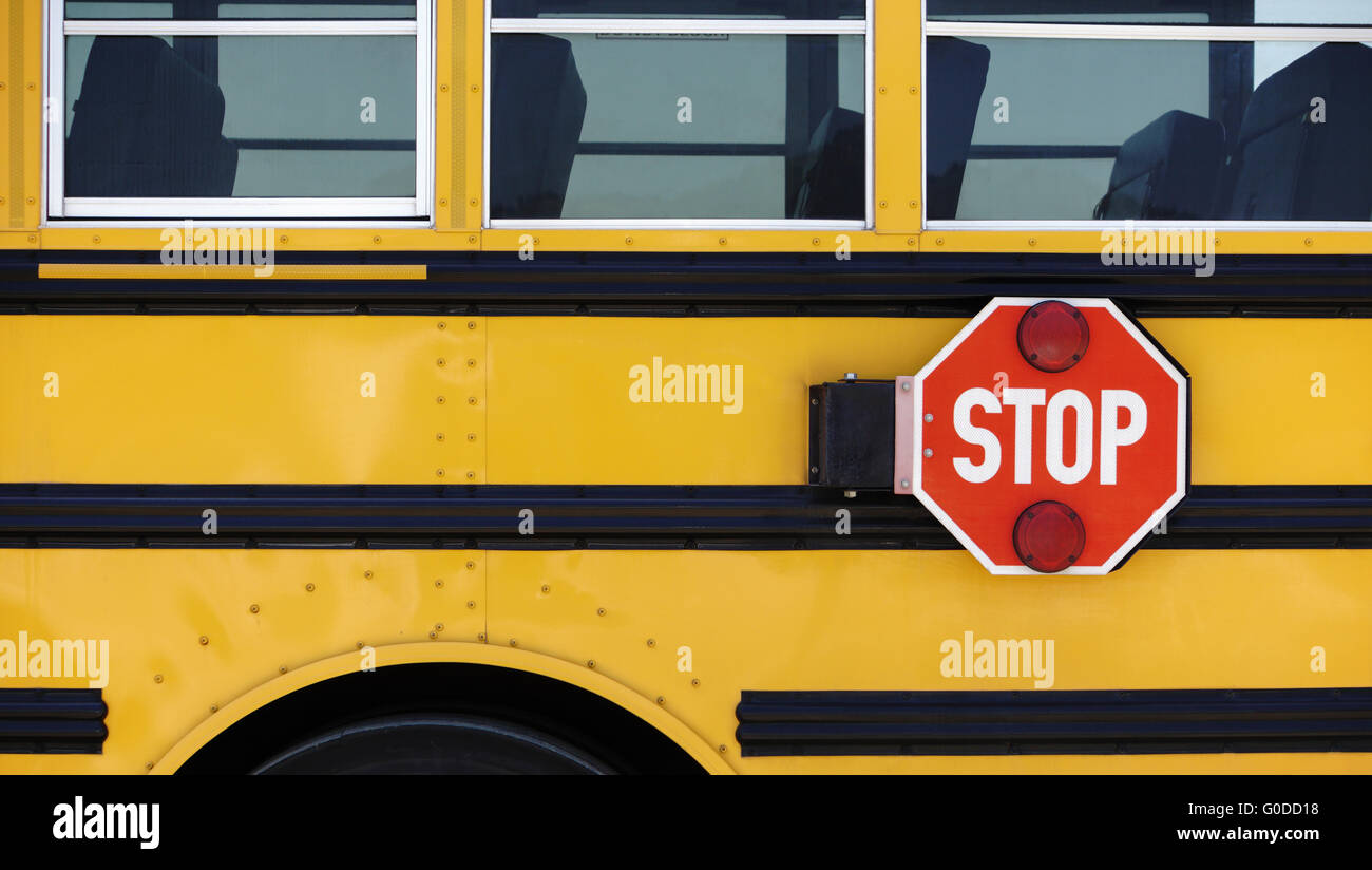Details of a School bus with a attached Stop sign Stock Photo - Alamy