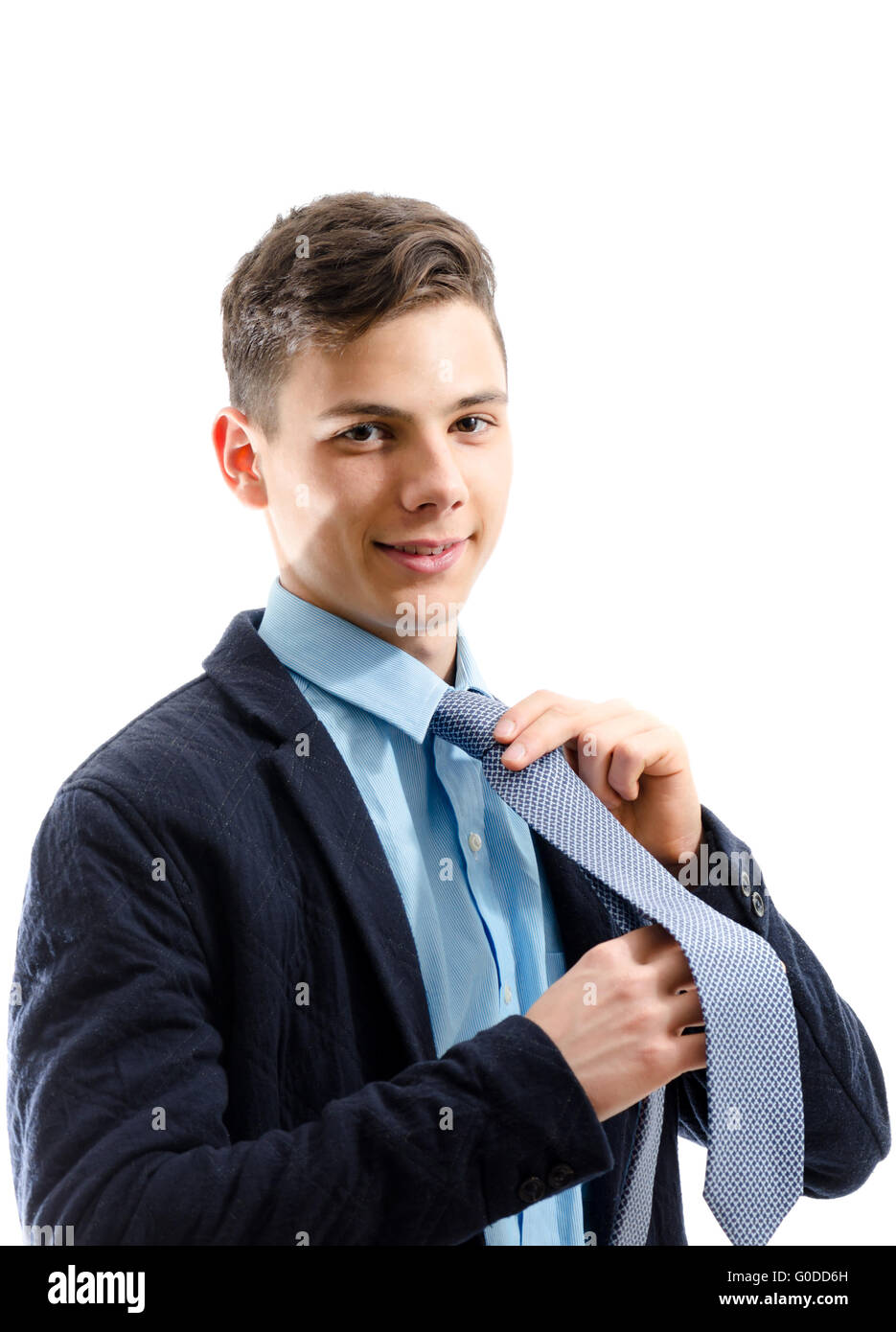 Teenager with tie getting dressed isolated on white background Stock ...