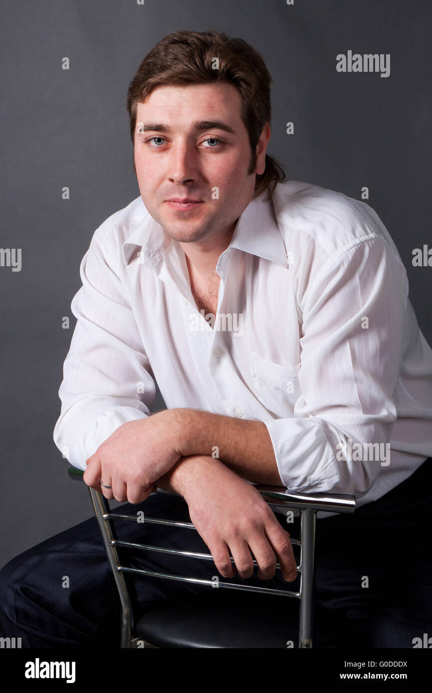 man posing in white shirt Stock Photo - Alamy