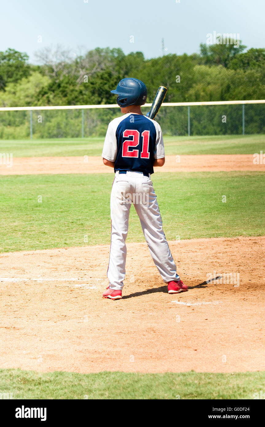 Teen baseball player at bat Stock Photo - Alamy